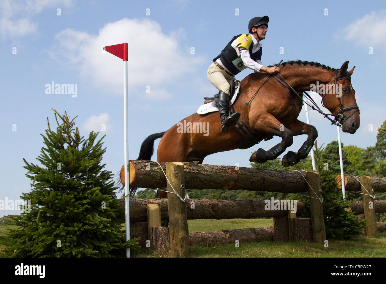 Horse & rider at cross-country horse trails; agility test, competitive ...