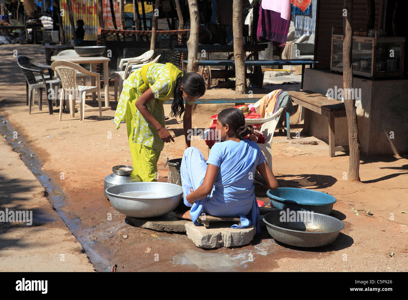 South asian indian woman washing hi-res stock photography and images ...