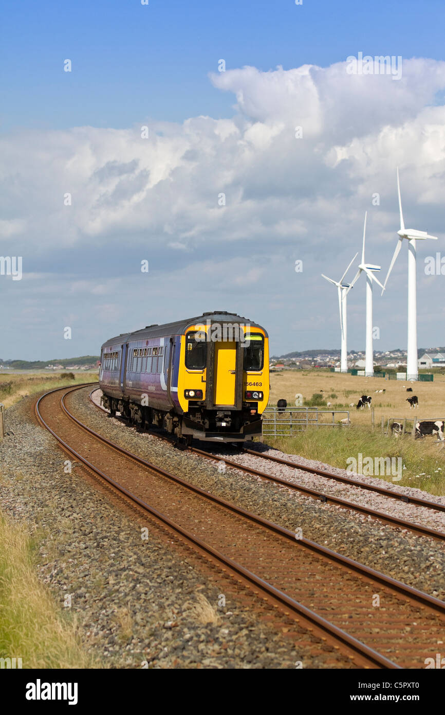 Sprinter Coastal Commuter Train and Wind Turbines at Siddick, Cumbria ...