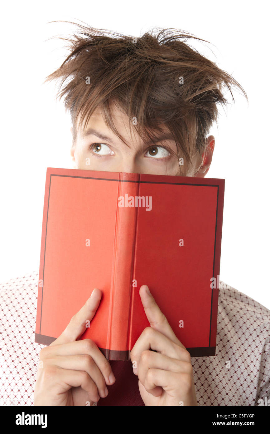 Crazy student holding red book on a white background Stock Photo - Alamy