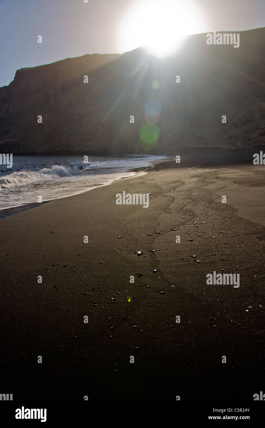 Volcanic beach with surf in sunset, Vik, Iceland Stock Photo - Alamy