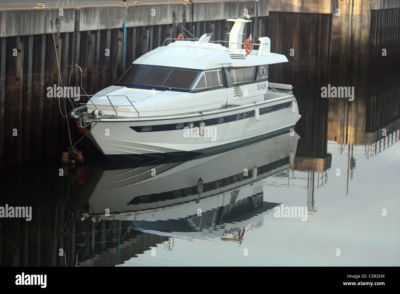 A speed boat in a harbour Stock Photo - Alamy
