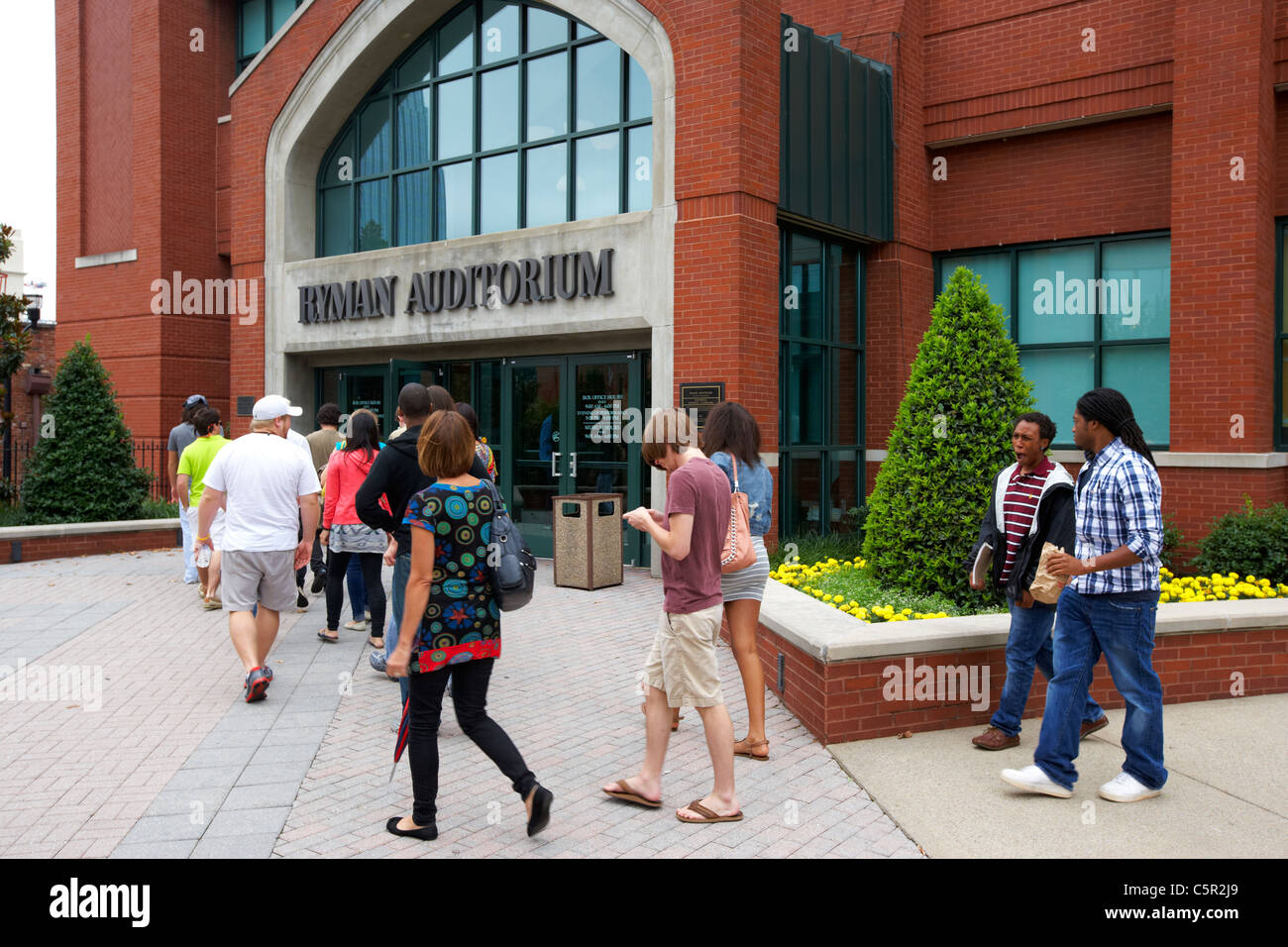 group entering modern entrance to the ryman auditorium Nashville ...