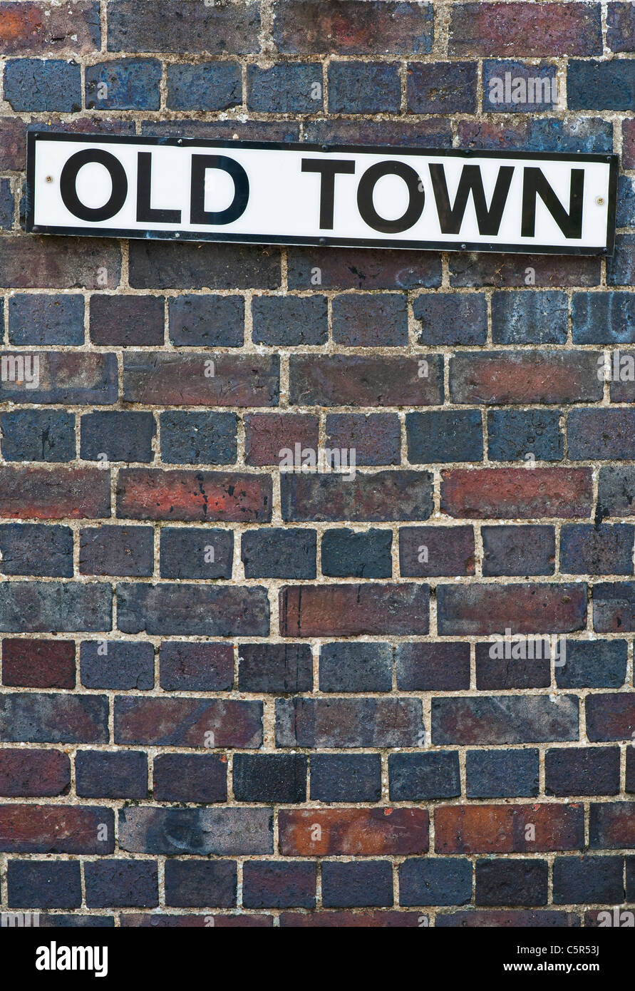 Old Town street sign on a dark brick wall. Brackley, Northamptonshire ...