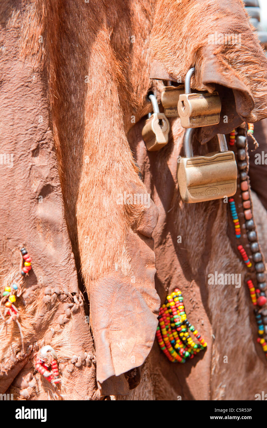 Detail of a traditional decorated goatskin worn by the Hamer ...