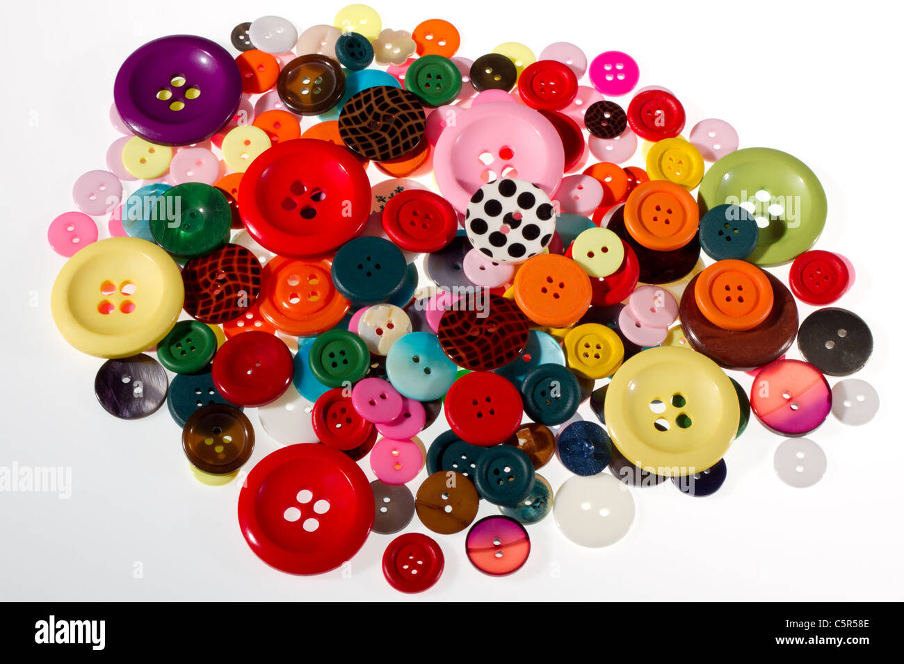 a pile of colorful and various sewing buttons Stock Photo - Alamy