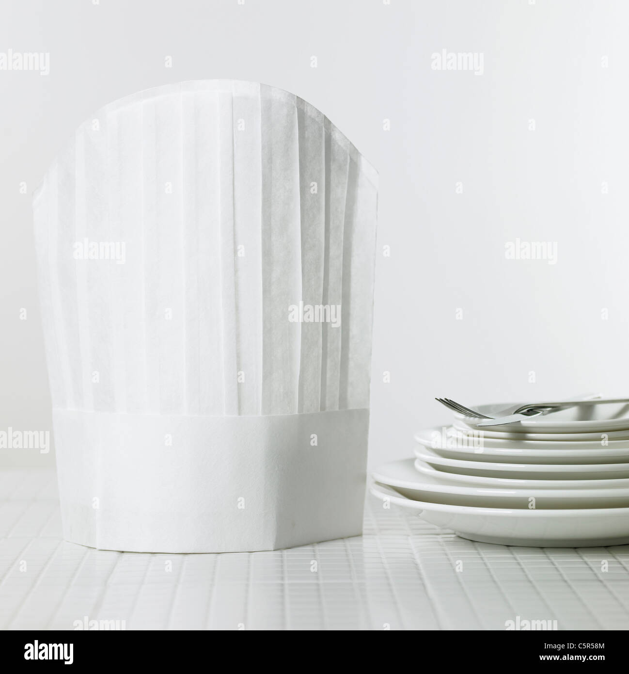 Cooker hat and dishes Stock Photo - Alamy