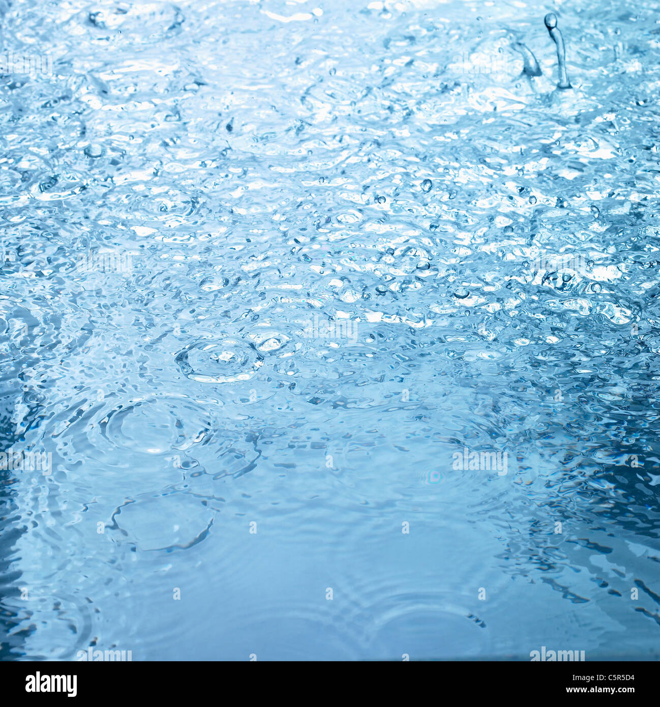 Dripping into water surface hi-res stock photography and images - Alamy