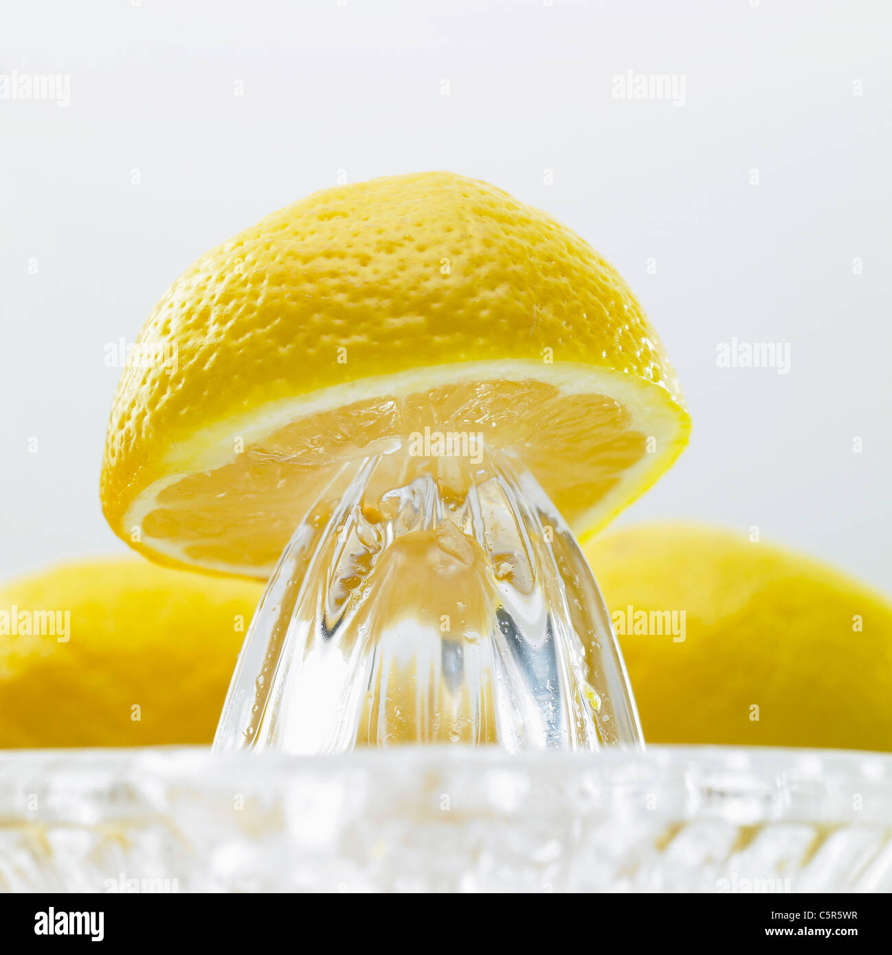 Lemon on a reamer Stock Photo - Alamy