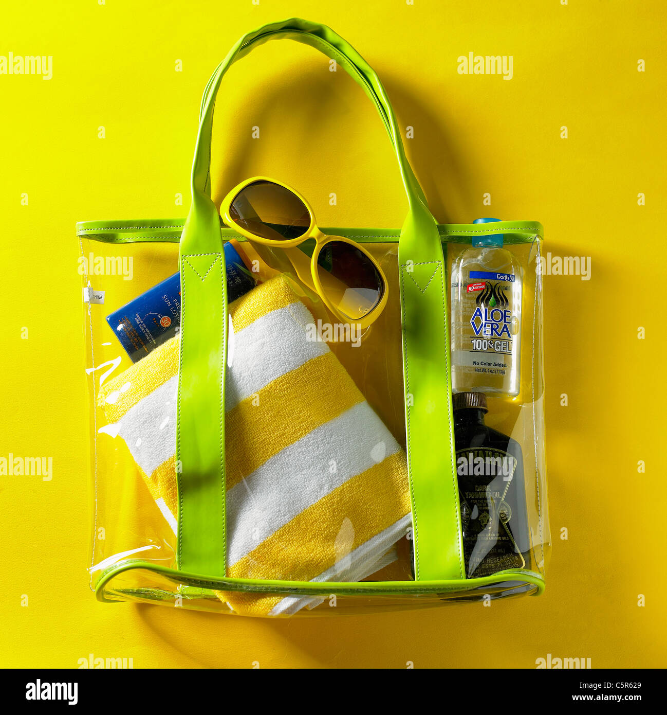 Summer items in a bag Stock Photo - Alamy