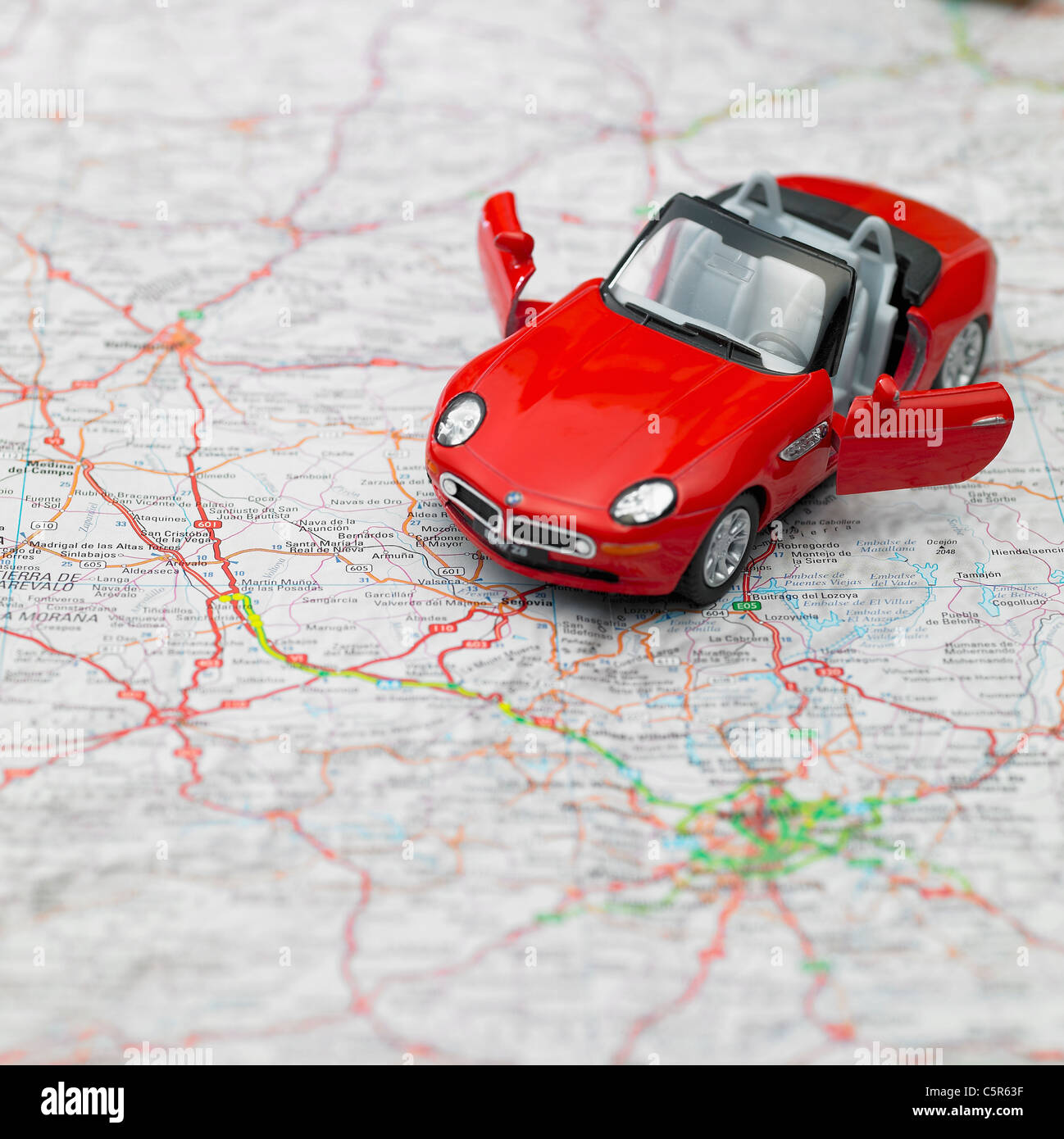 A toy car on a map Stock Photo - Alamy
