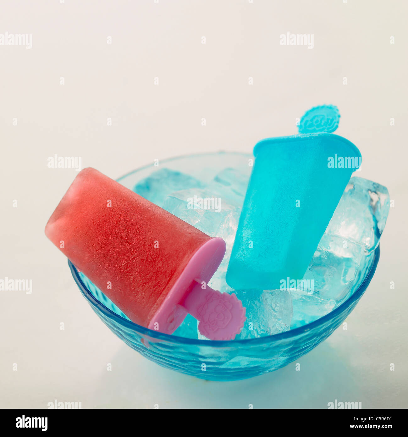 Popsicles in ice bowl Stock Photo - Alamy