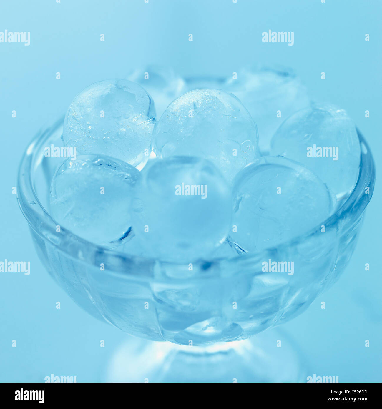 Round ice in a bowl Stock Photo - Alamy