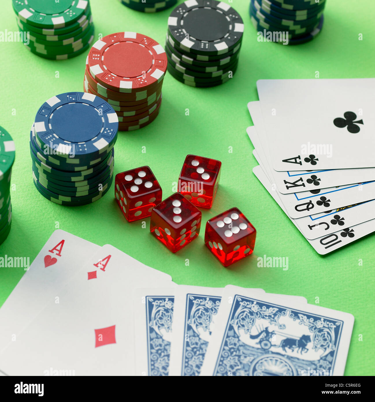 Dice, gambling chips and poker cards Stock Photo - Alamy