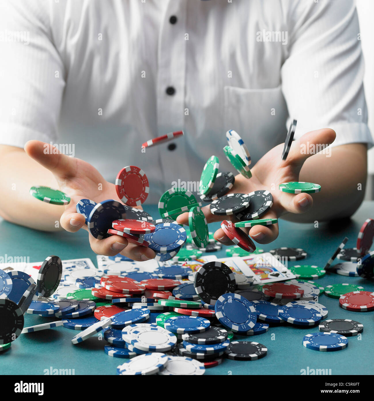 A person playing cards Stock Photo - Alamy