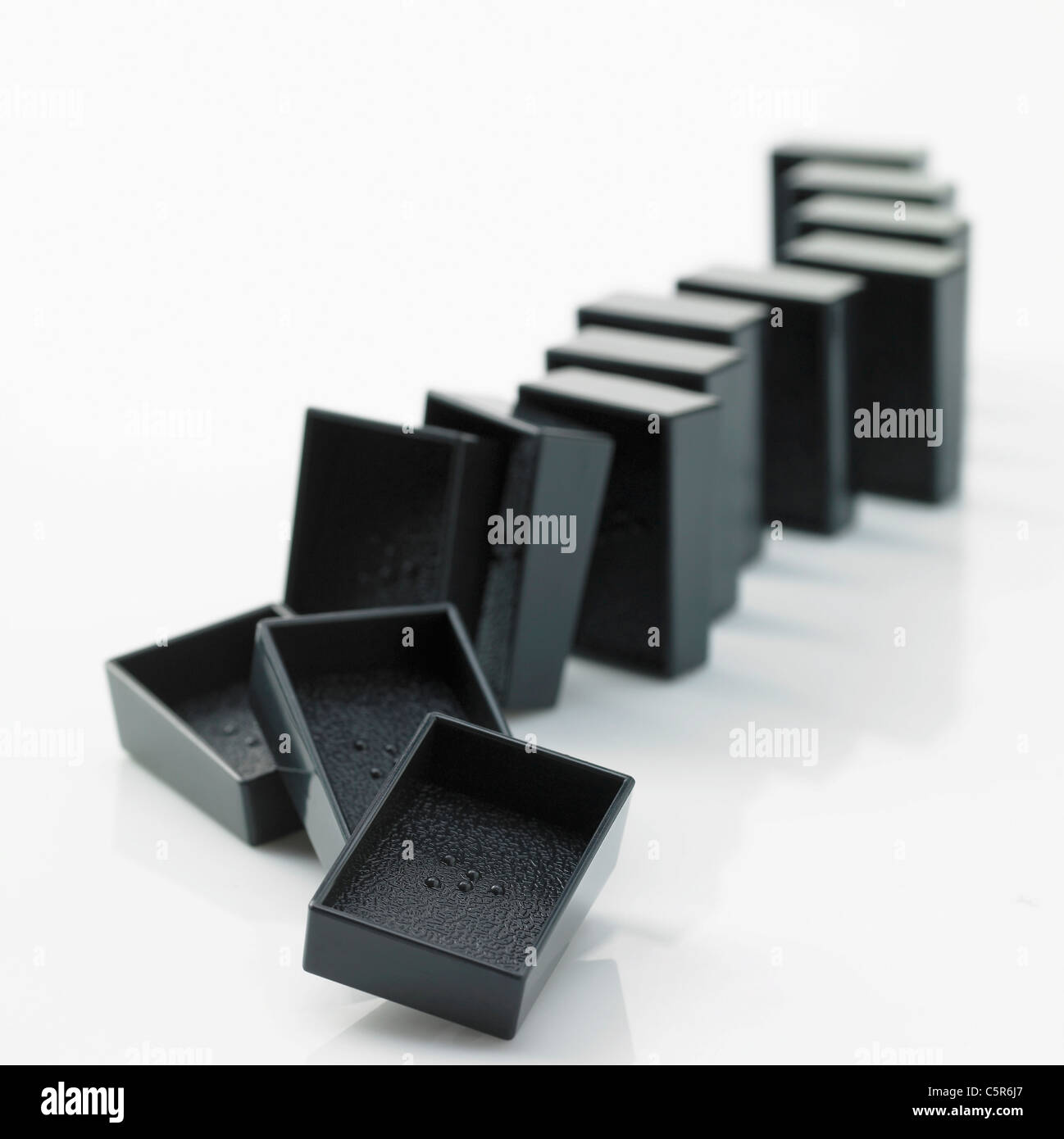 Dominoes falling down hi-res stock photography and images - Alamy