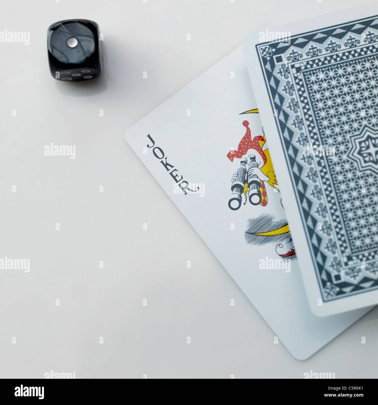 A dice and playing cards Stock Photo - Alamy