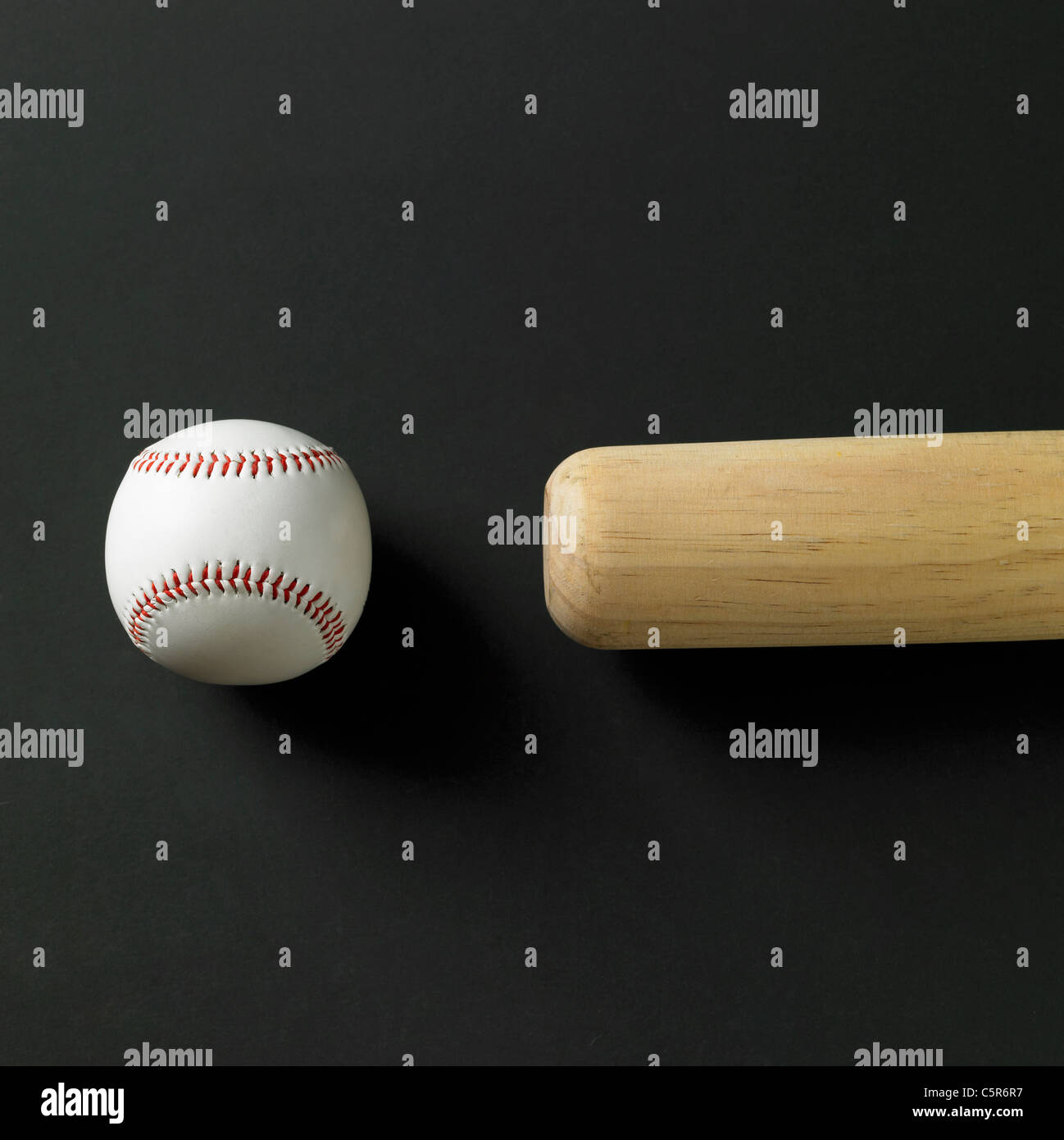 Directly-above view of a bat and a ball in a row Stock Photo - Alamy