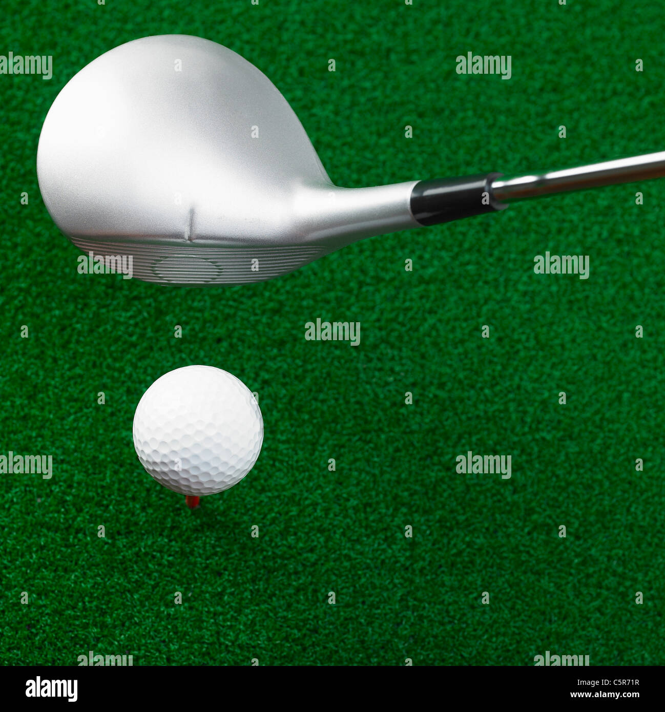 A golf ball and a golf clubs Stock Photo - Alamy