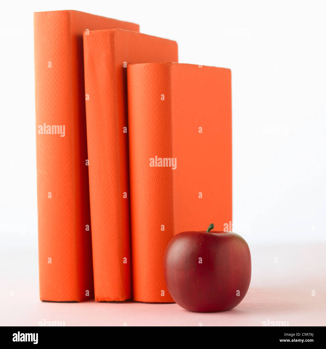 Books and apples Stock Photo - Alamy