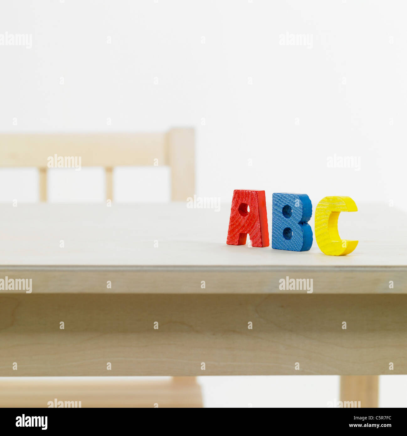 Alphabet letters on a desk Stock Photo - Alamy