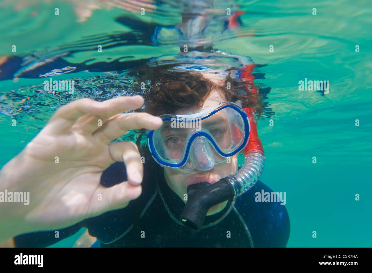 Diver gives the 'Im OK' signal Stock Photo - Alamy