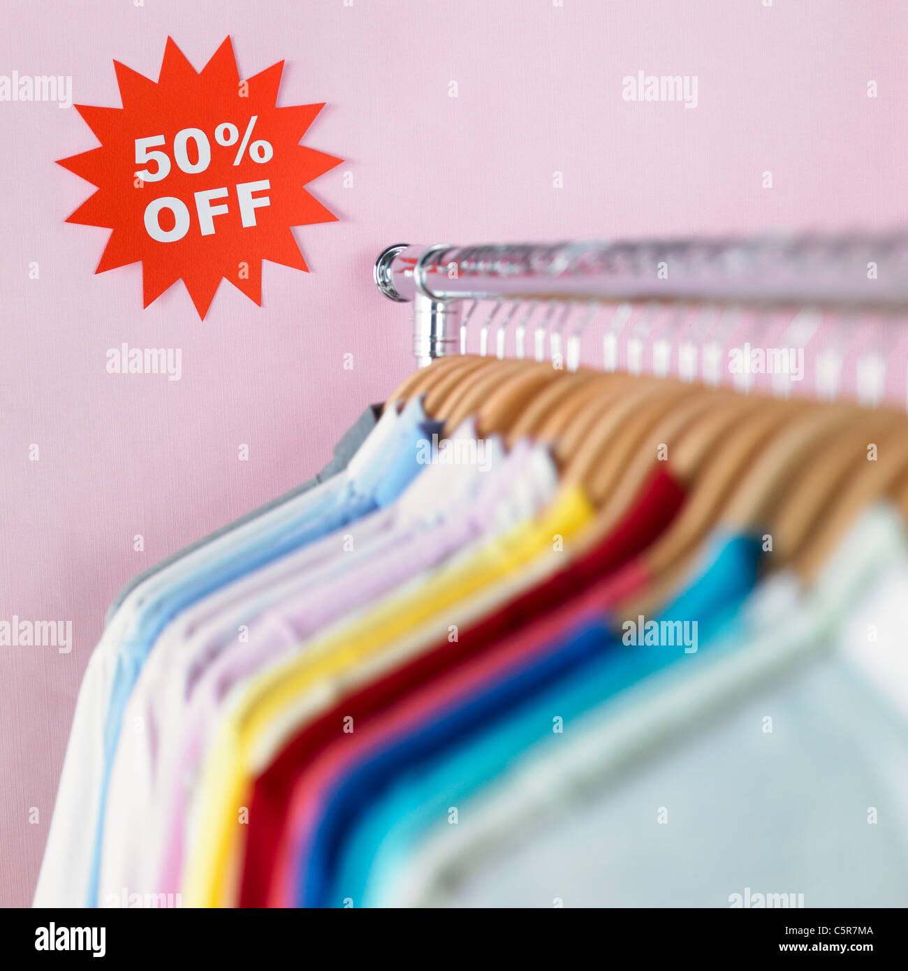 Clothes on sale Stock Photo - Alamy
