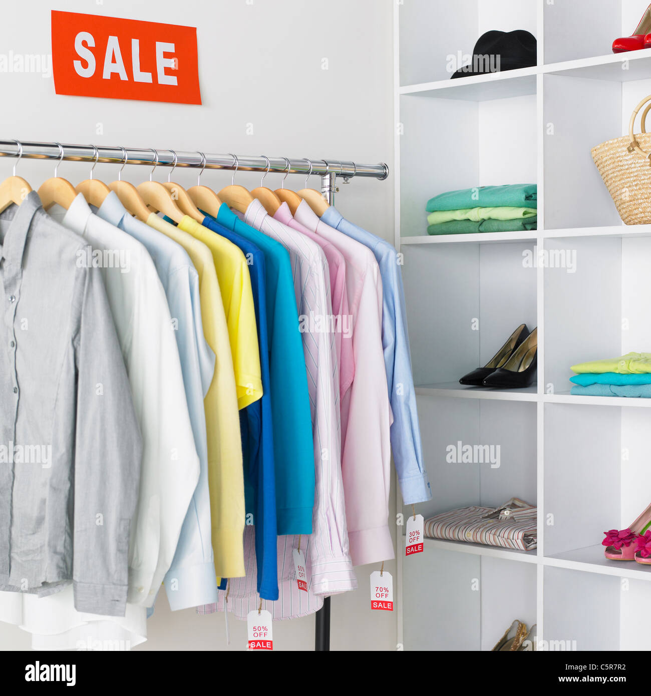 Goods displayed with sales sign Stock Photo - Alamy