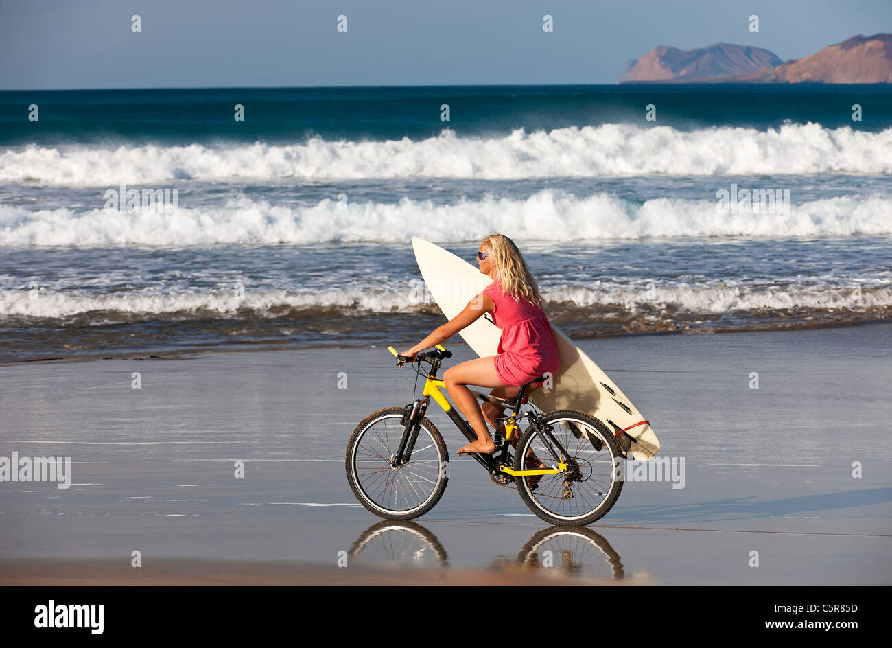 Surfer cycle hi-res stock photography and images - Alamy