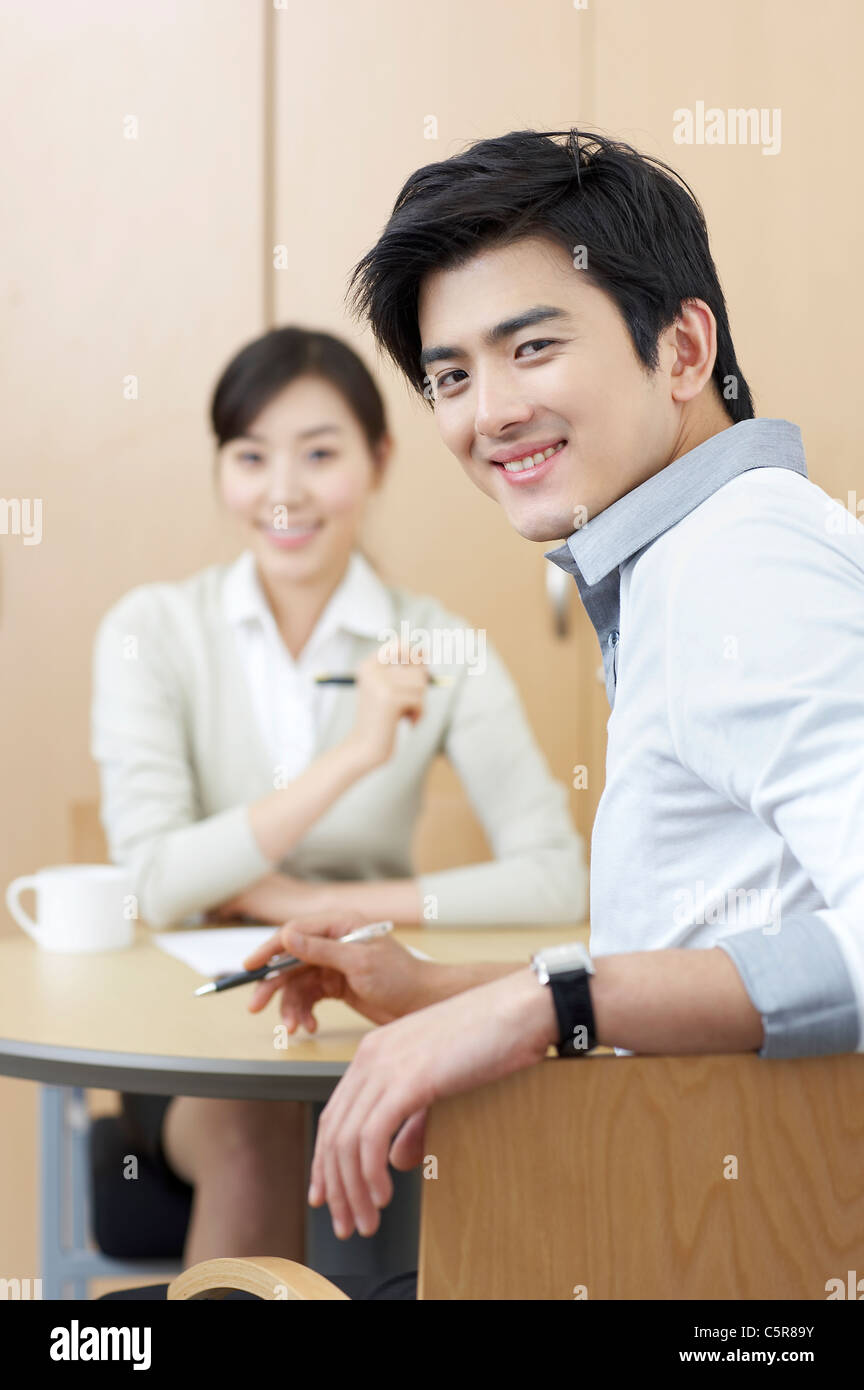 Person holding two office chairs hi-res stock photography and images ...