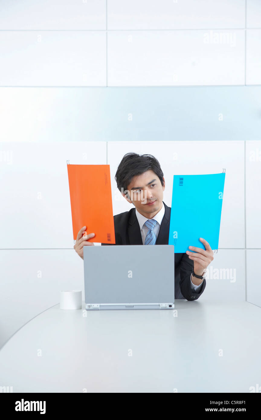 Man thinking about files hi-res stock photography and images - Alamy