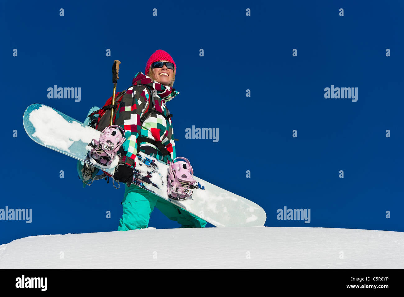 A happy snowboarder smiles Stock Photo - Alamy