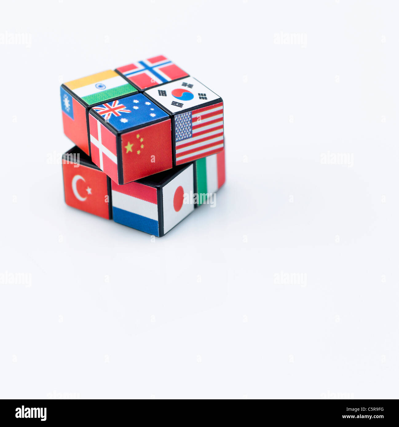 A puzzle block with various countries' flags on it Stock Photo - Alamy
