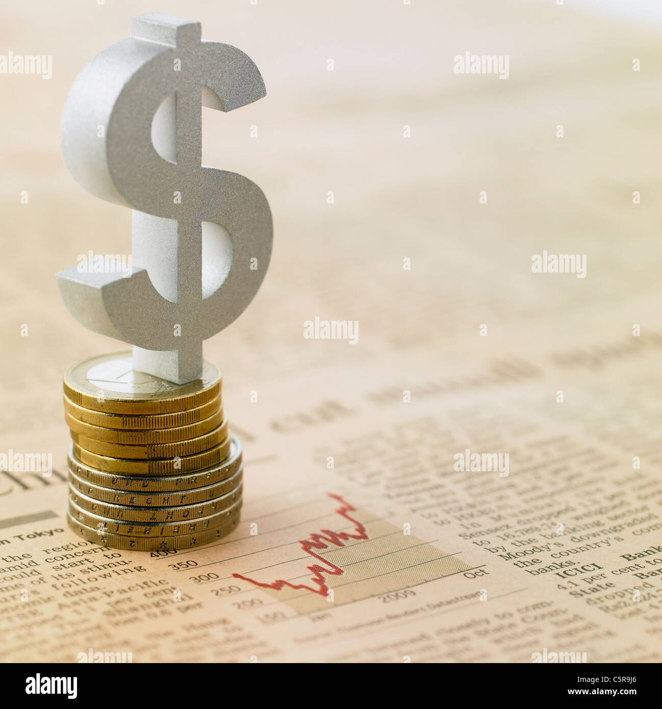 Coins and dollar symbols hi-res stock photography and images - Alamy