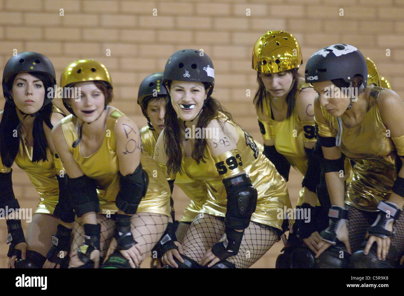 Bridgend Bombshells flat track roller derby team warming up at Neath ...