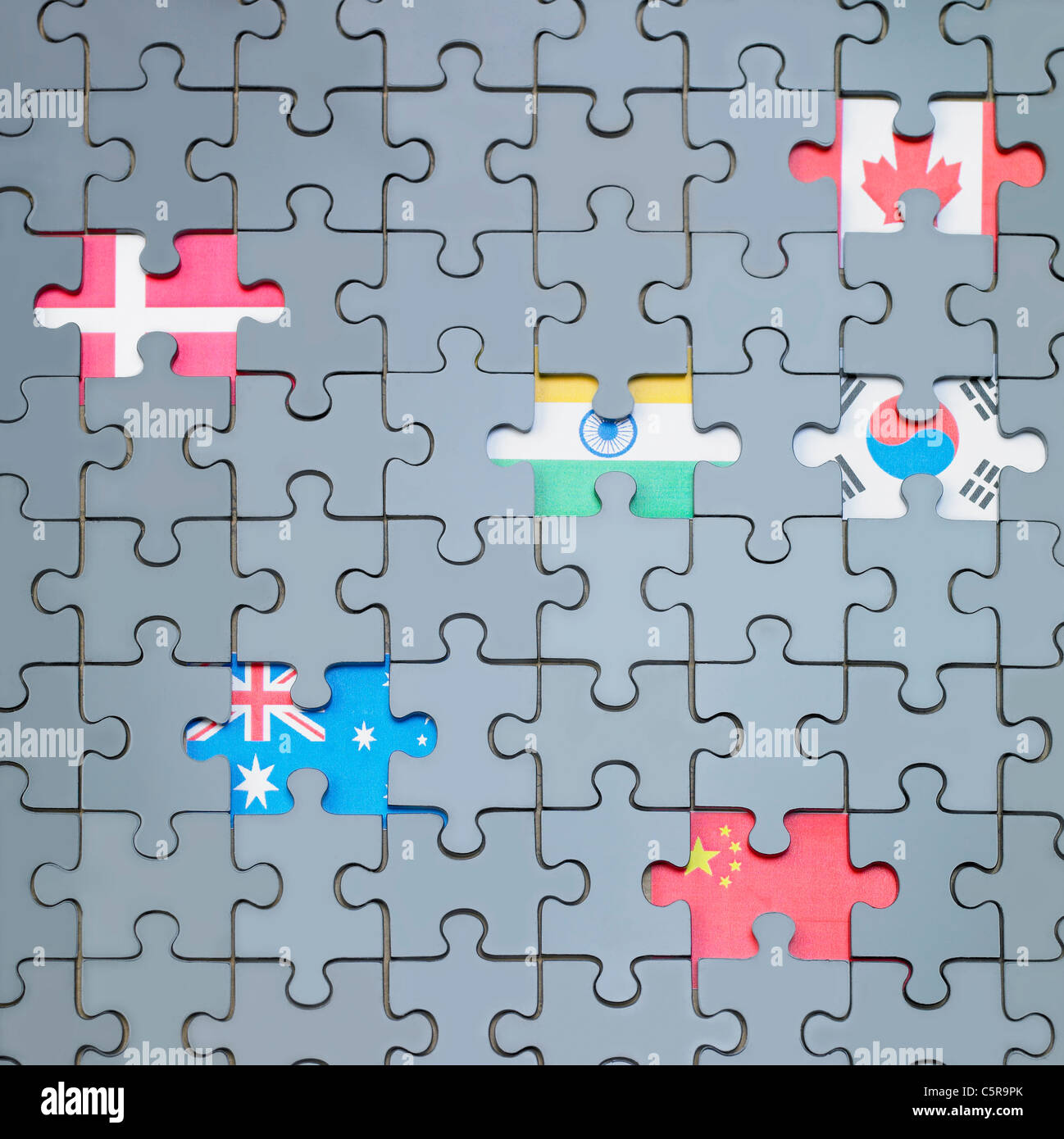 Puzzles with flags from different countries Stock Photo - Alamy