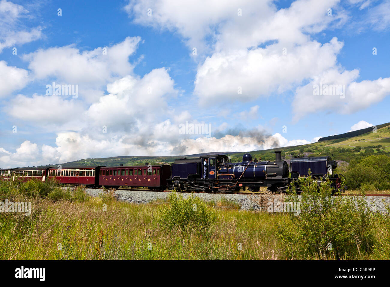 Welsh Highland Railway steam train travelling through Snowdonia ...