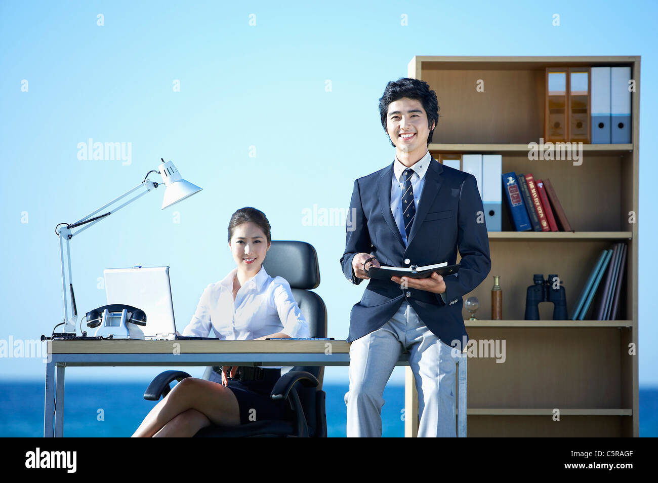 Two people at the office outside Stock Photo - Alamy