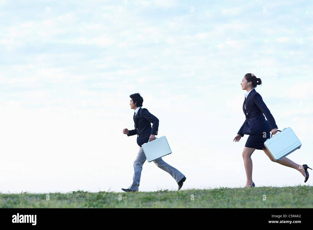 Asian businessman running on hi-res stock photography and images - Alamy