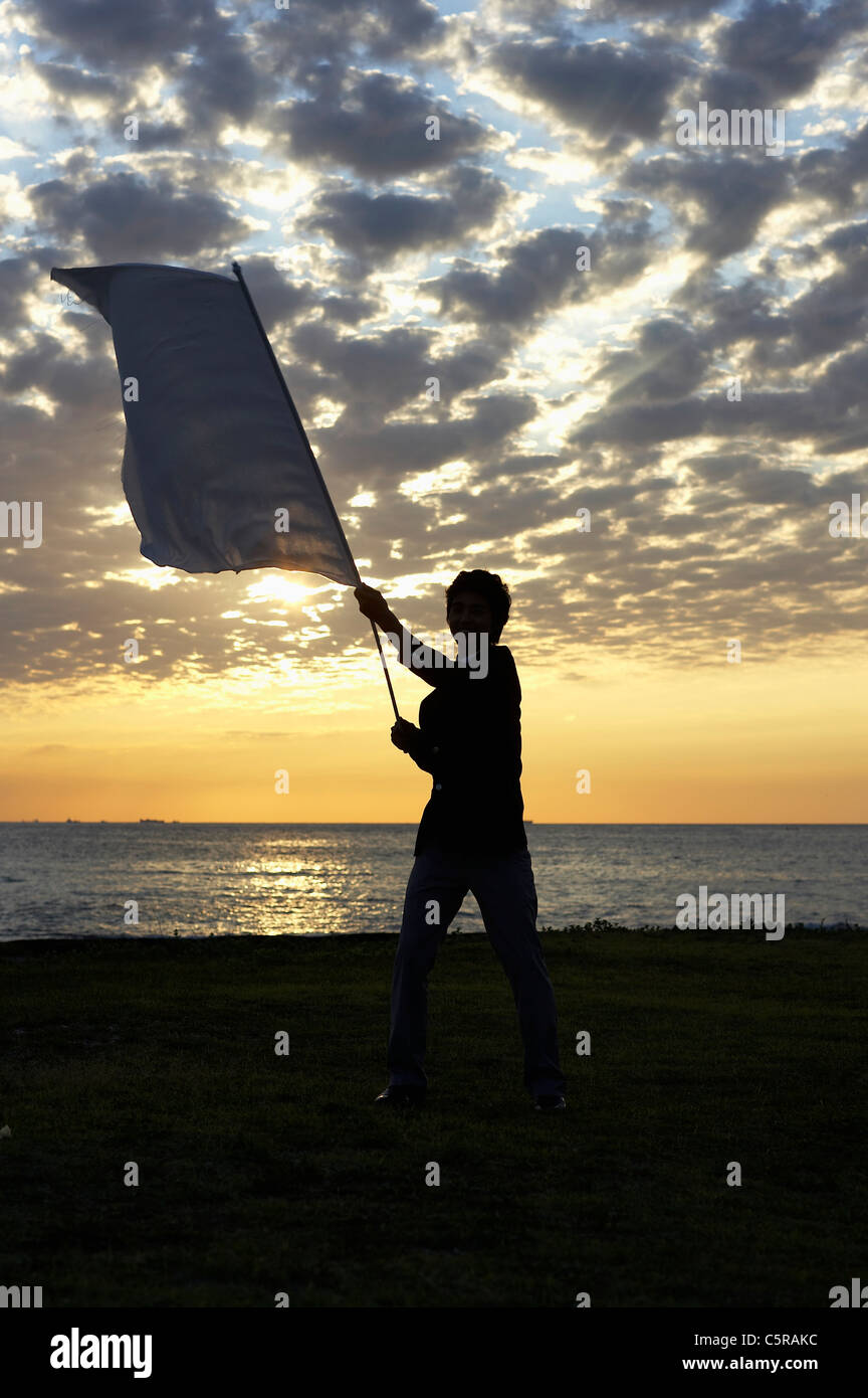 Man waving a flag hi-res stock photography and images - Alamy