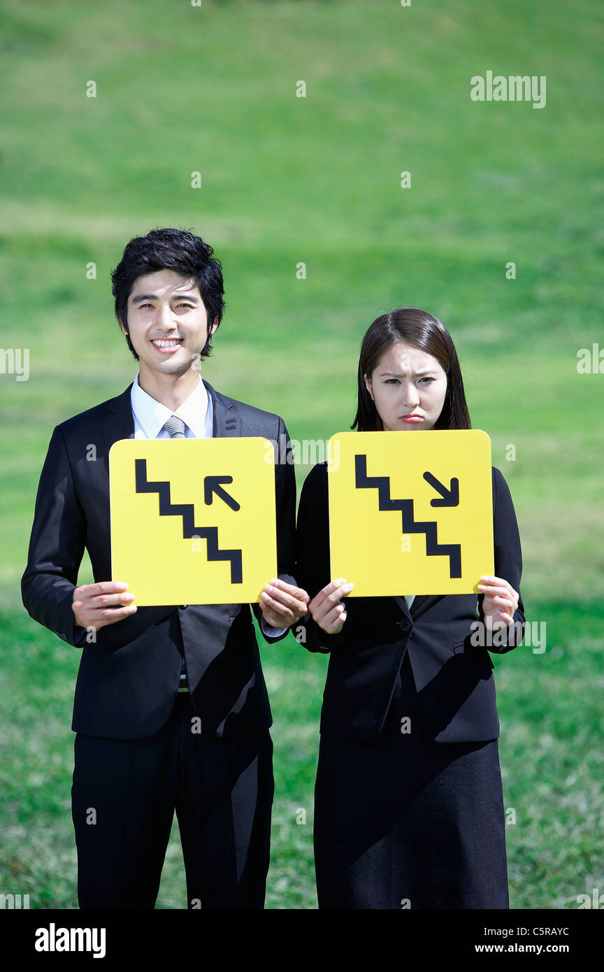 Three women holding signs hi-res stock photography and images - Alamy