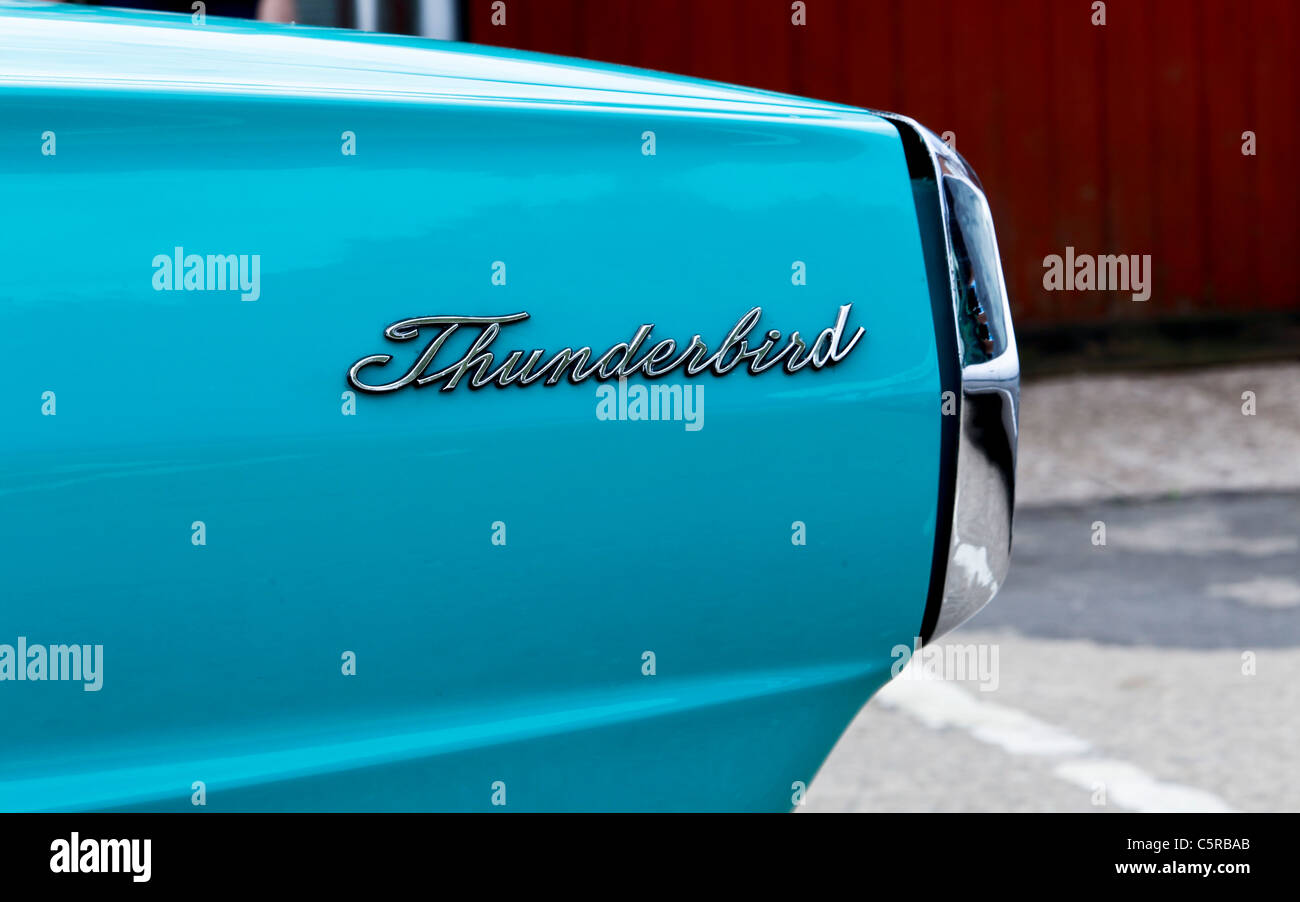 A 1965 pale blue Ford Thunderbird convertible with a mature couple ... A 1965 pale blue Ford Thunderbird convertible with a mature couple ...