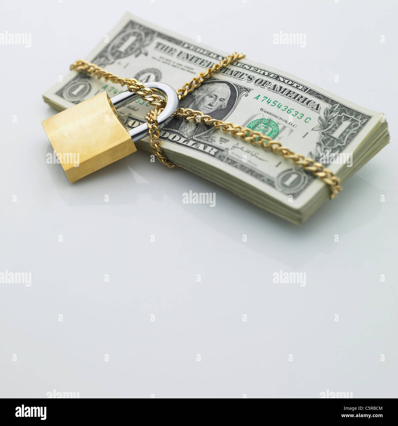 Dollars with a chain hi-res stock photography and images - Alamy