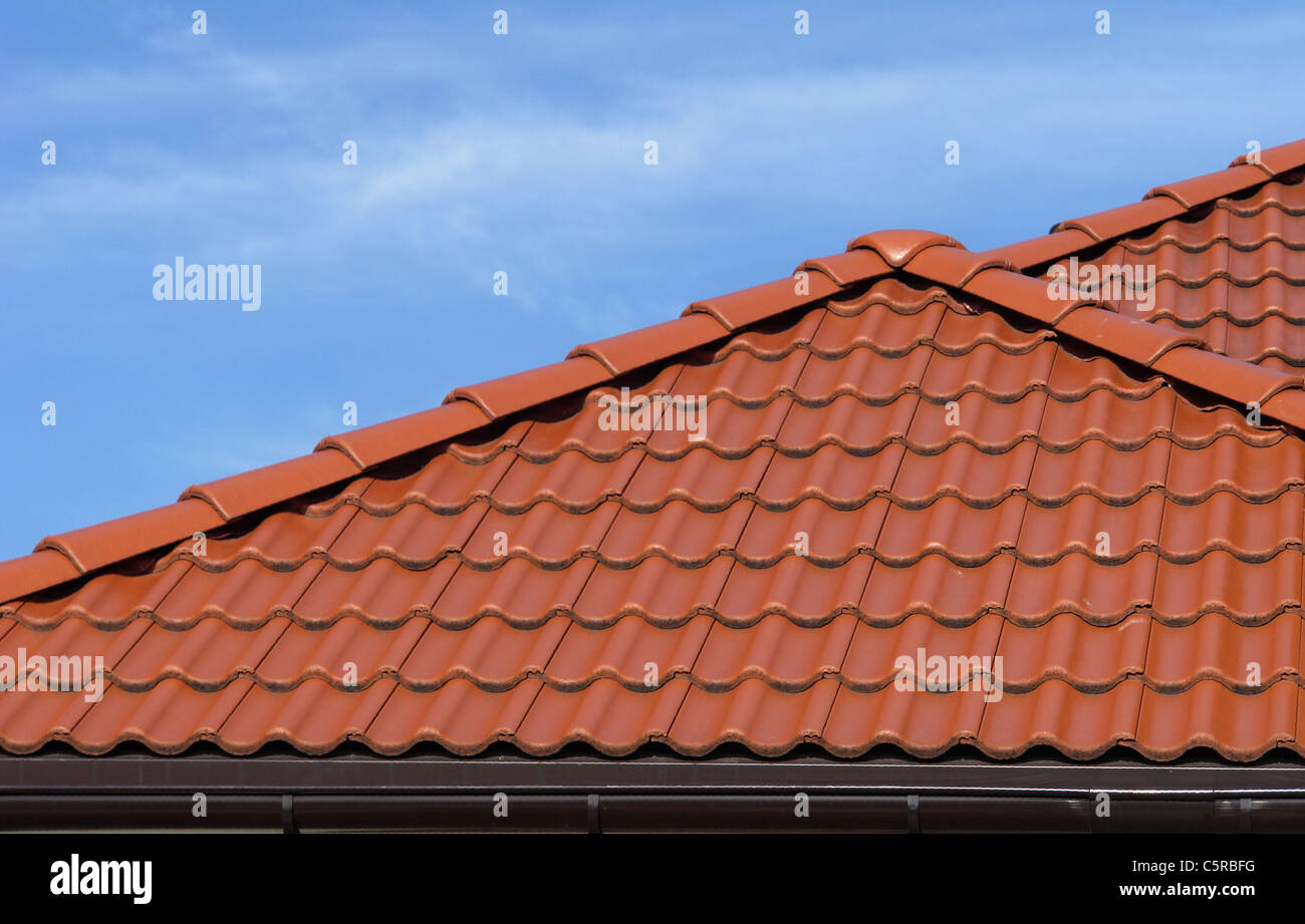 red roof against the blue sky, a picture made in poland Stock Photo - Alamy