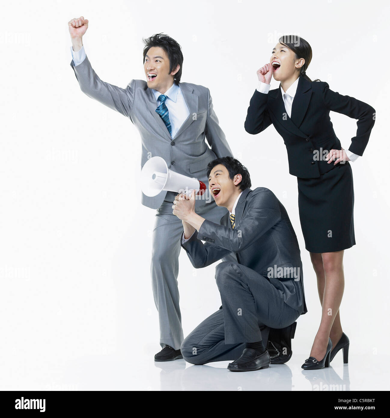 Three people screaming Stock Photo - Alamy