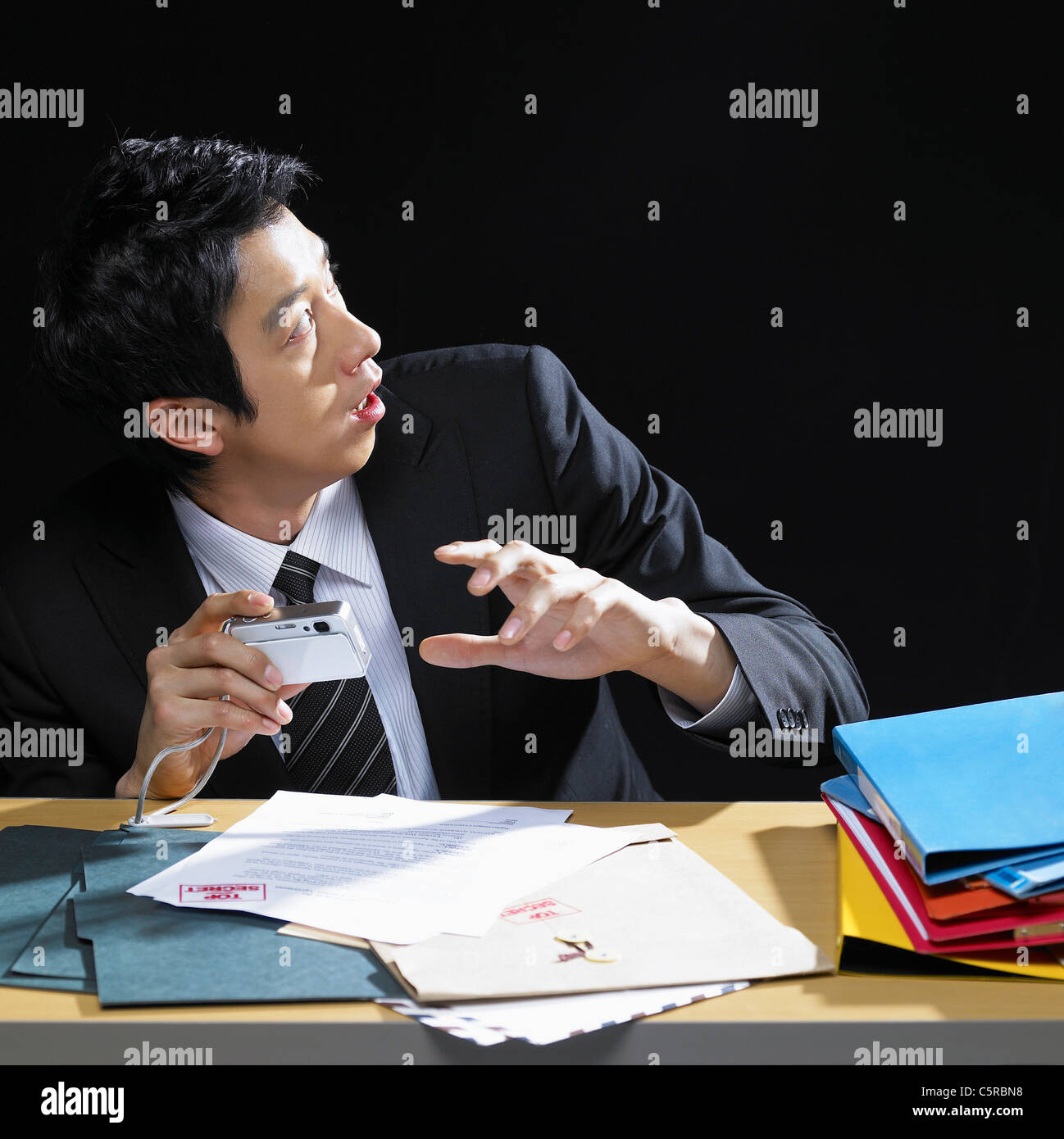 A man caught sneaking to the classified documents Stock Photo - Alamy