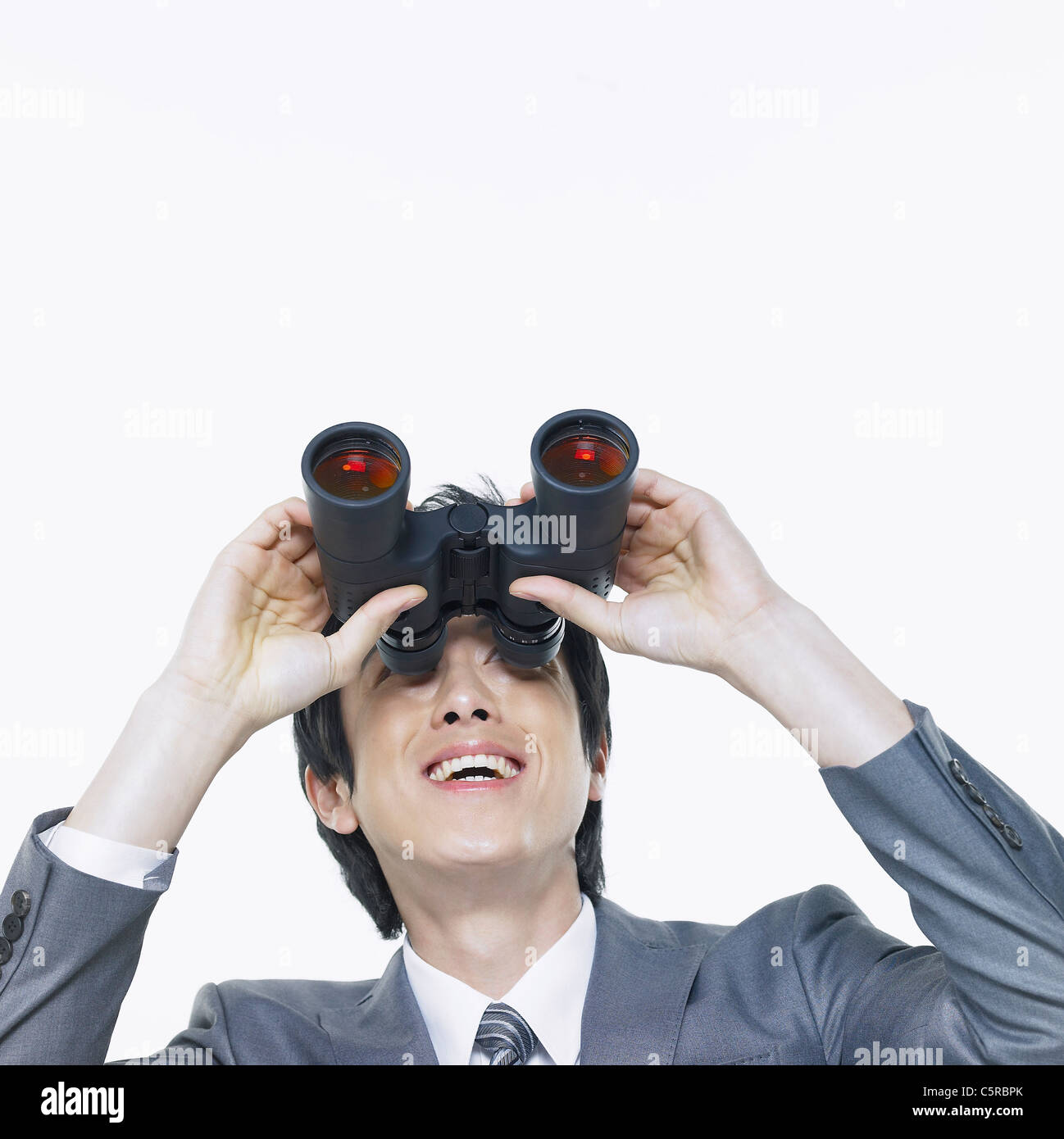 Business man telescope hi-res stock photography and images - Alamy