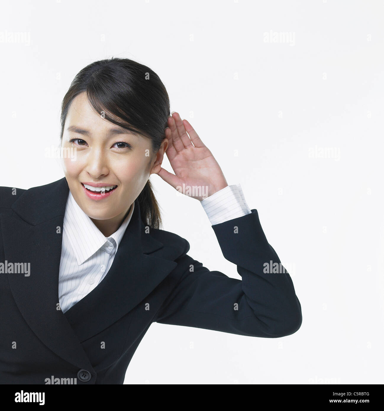 Woman listening something hand hi-res stock photography and images - Alamy