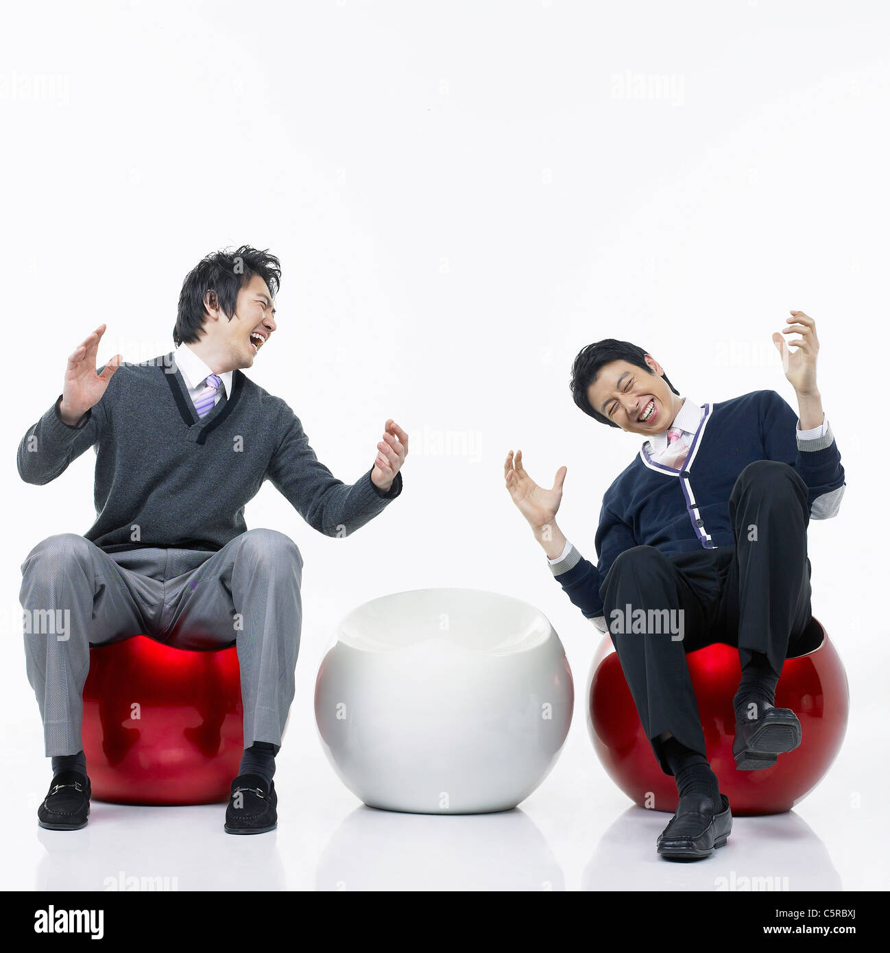 Two men joyfully having conversation Stock Photo - Alamy
