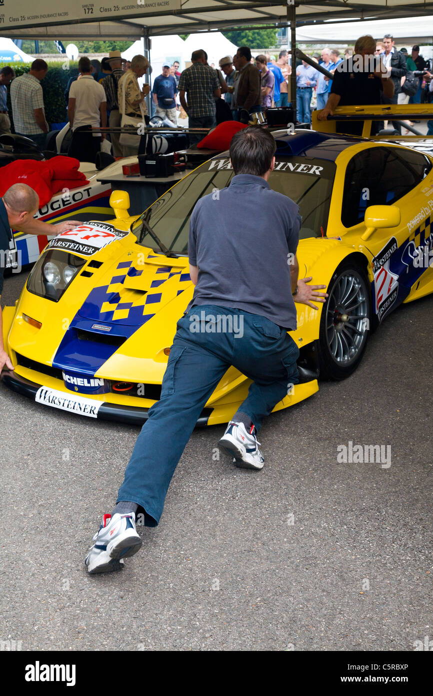 1997 McLaren-BMW F1 GTR "Longtail" being pushed into the garage at the ...